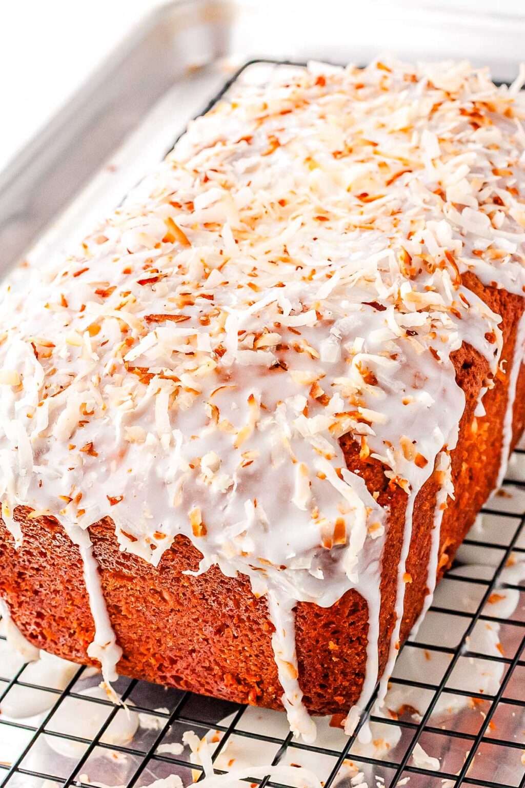 Coconut Sweet Bread with Coconut Glaze - The Cozy Fork